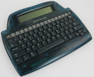 Typewriters & Word Processors - Portable Word Processor Writing