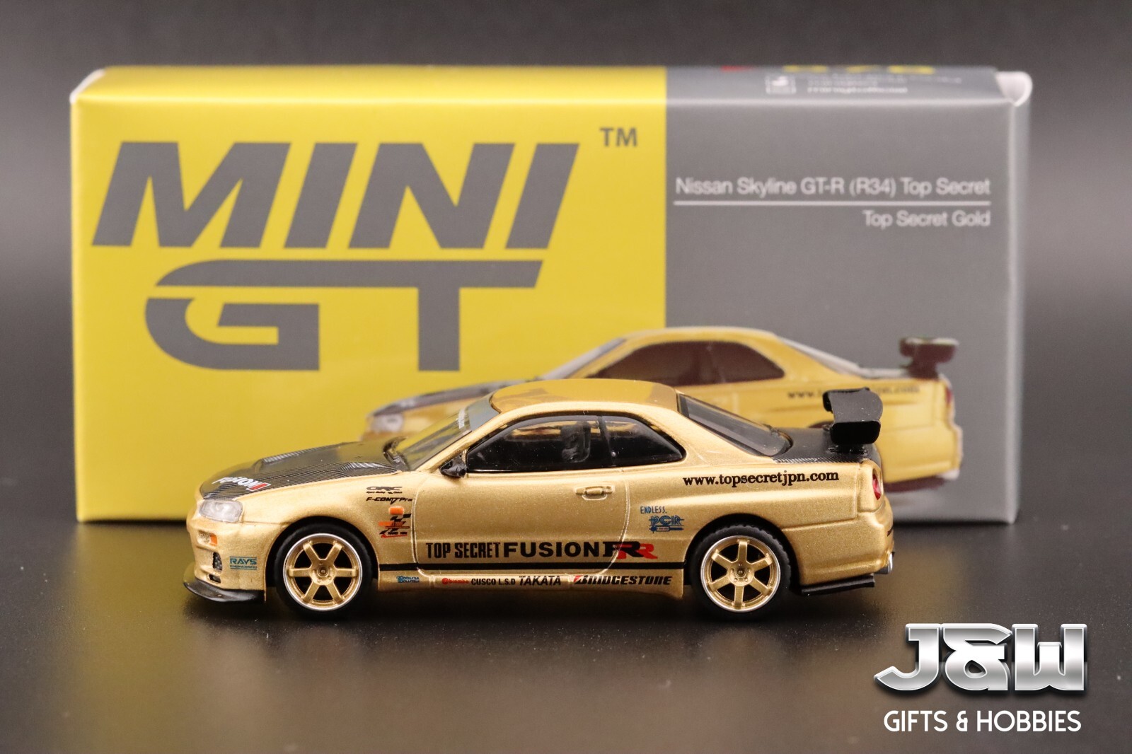Mini GT Nissan Skyline GT-R (R34) Top Secret Gold Japan Mini GT Nissan Skyline GT-R (R34) Top Secret Gold Japan