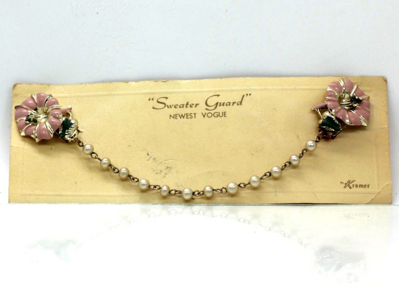 VINTAGE 1950's KRAMER sweater guard/clips on original card VINTAGE 1950's KRAMER sweater guard/clips on original card