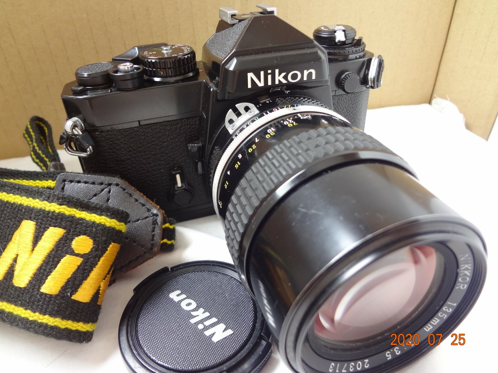 Nikon FE SLR Camera Black body with Ai 135mm/f3.5 lens,strap Nikon FE SLR Camera Black body with Ai 135mm/f3.5 lens,strap