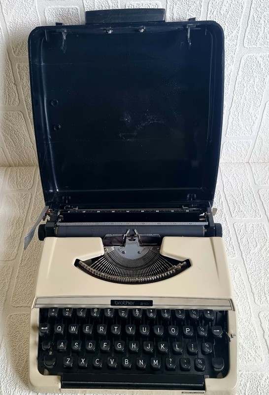 Brother typewriter photos of Brother 210 by year then serial number by date