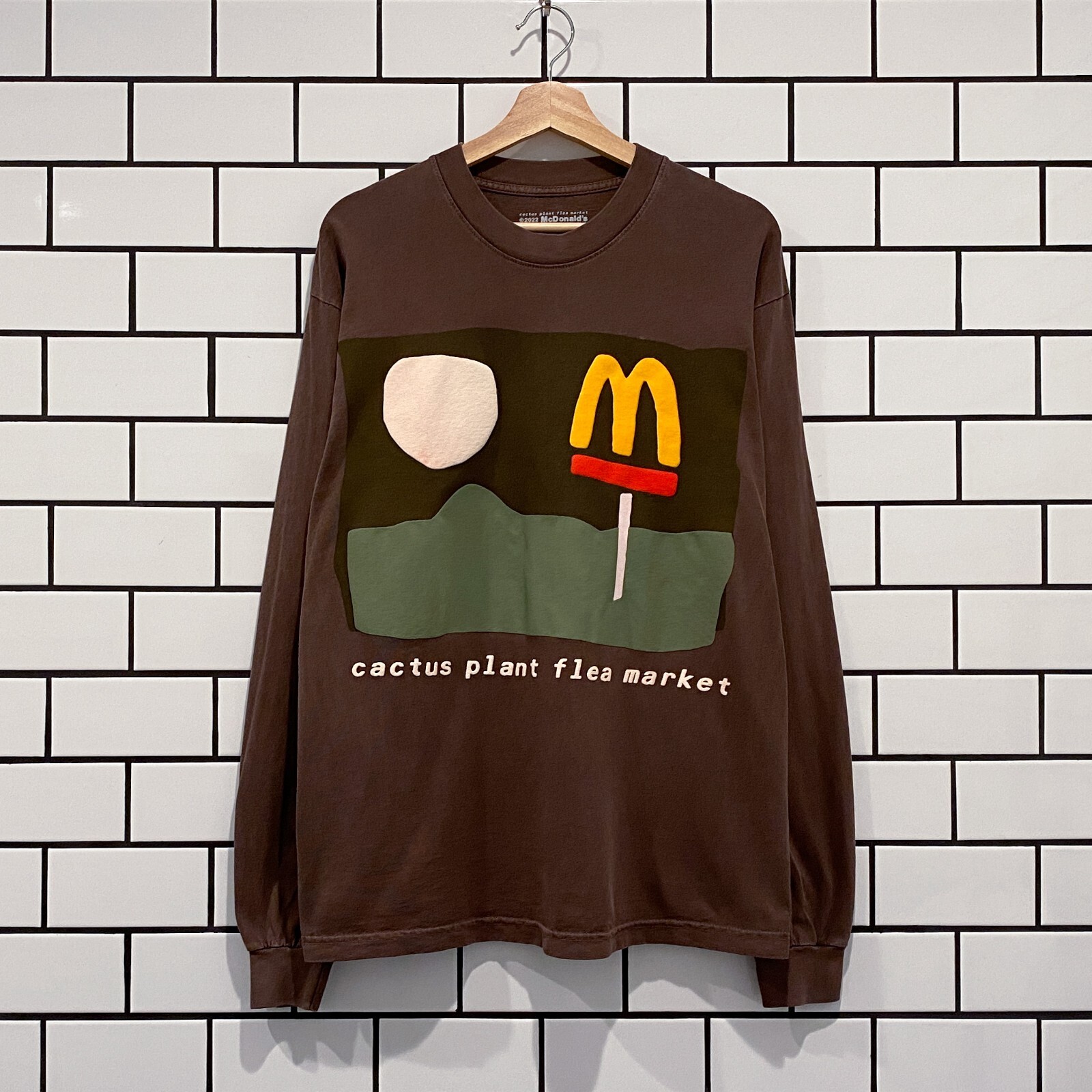 CACTUS PLANT FLEA MARKET CPFM X MCDONALDS 24/7 LS TEE BROWN CACTUS PLANT FLEA MARKET CPFM X MCDONALDS 24/7 LS TEE BROWN