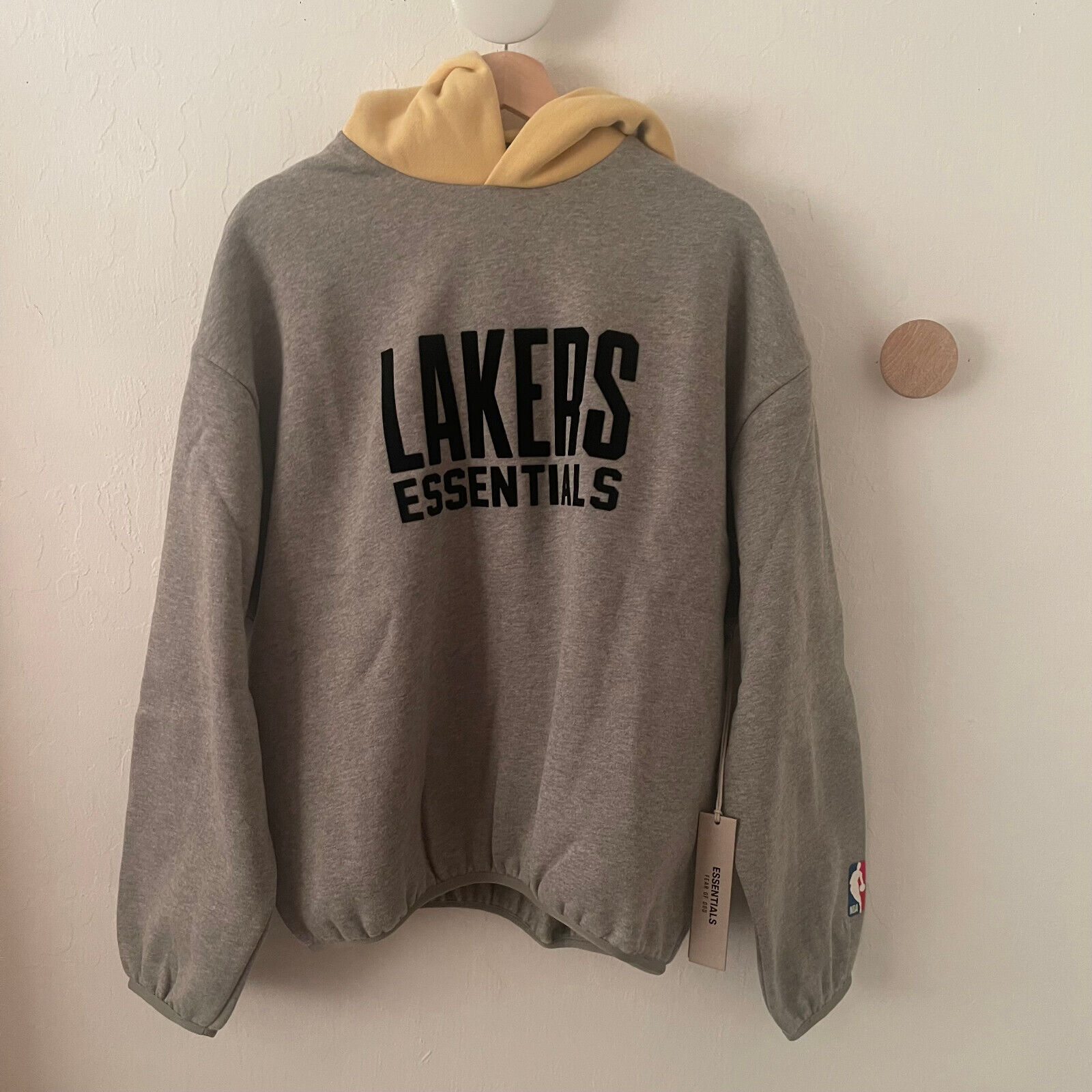 FEAR OF GOD Essentials x NBA Los Angeles Lakers Hoodie FEAR OF GOD Essentials x NBA Los Angeles Lakers Hoodie