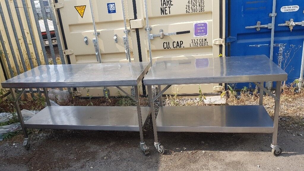 2 x Stainless steel catering tables on wheels . Work bench , butchers ...