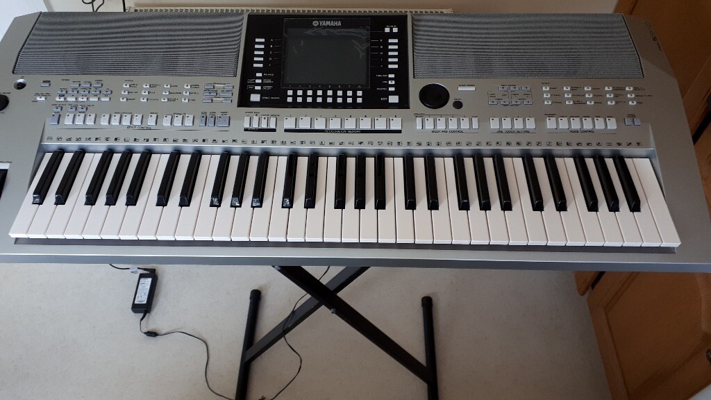 Yamaha PSR S910 keyboard. Excellent condition. Includes music stand ...