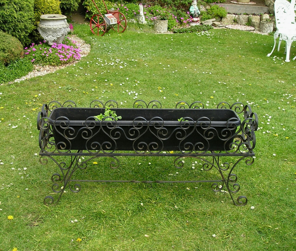 Four large vintage wrought iron plant display stands, troughs, planters ...