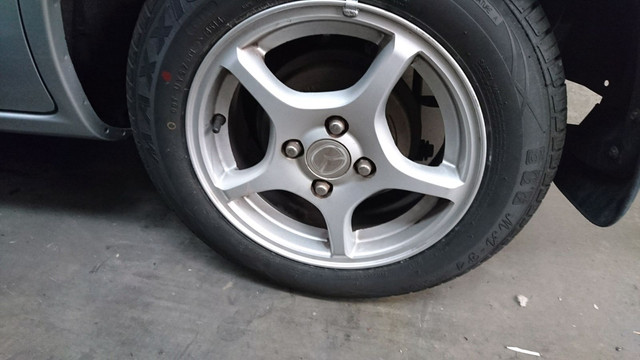 MAZDA 323 BJ FORD LASER 1990-03 14 ALLOY WHEELS NEW MAXXIS TYRES ...