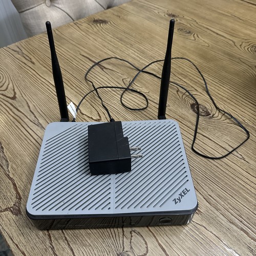 Qwest CenturyLink Approved Zyxel Q1000Z Modem Router With Power Cord | eBay
