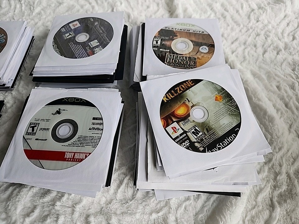 Huge lot of 200 Loose Video Game Discs - Xbox, 360, Wii, PS1, PS2, PS3 ...