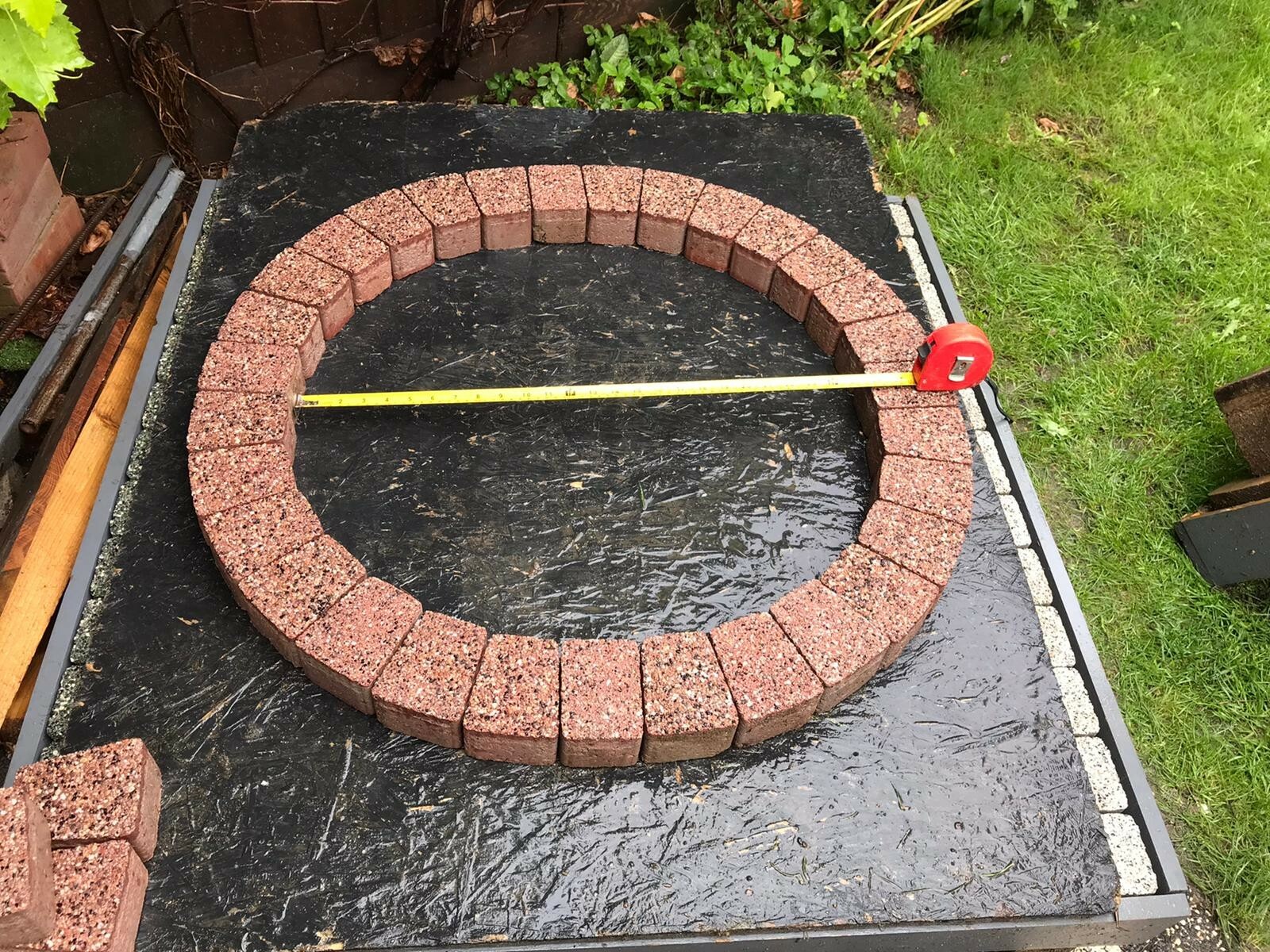 rounded fire pit kit brick Fireplace concrete stones log burner wood ...