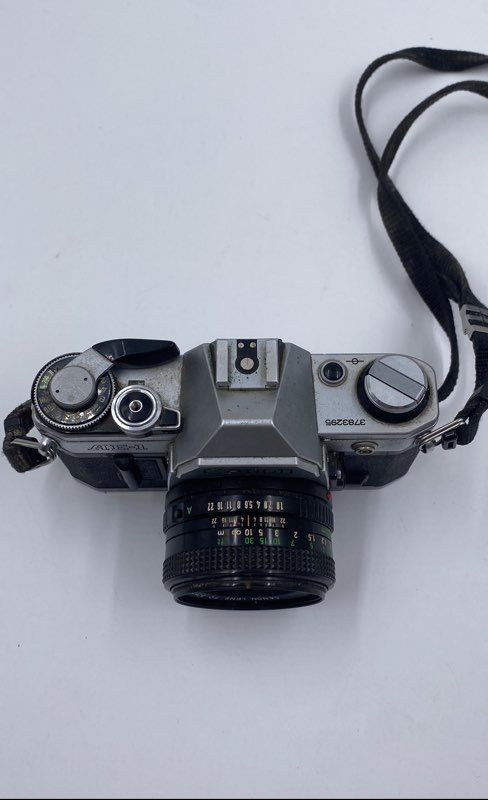 Canon AE-1 Black Silver 35mm Manual Focus SLR Film Camera With Lens | eBay