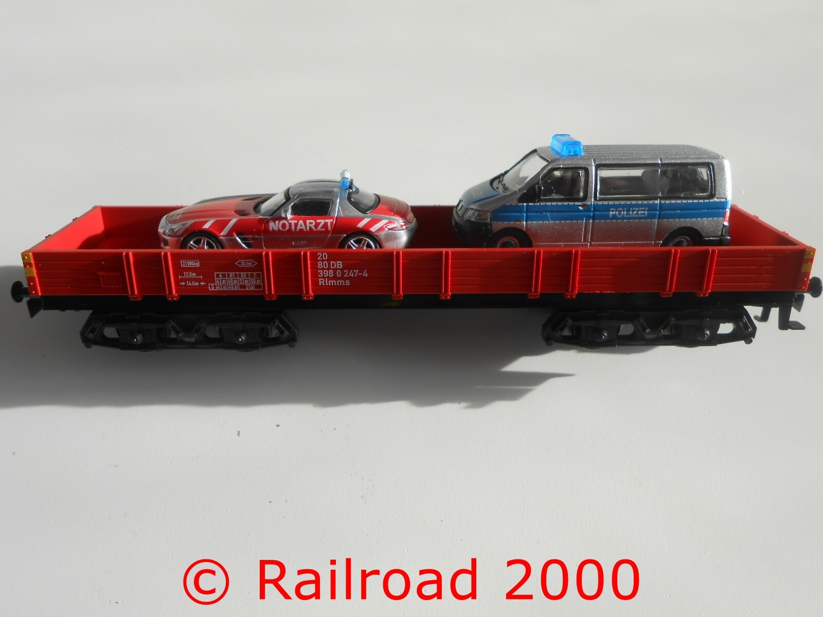 Märklin aus 78752 Vierachsiger Niederbordwagen mit 2 Einsatzfahrzeugen ...