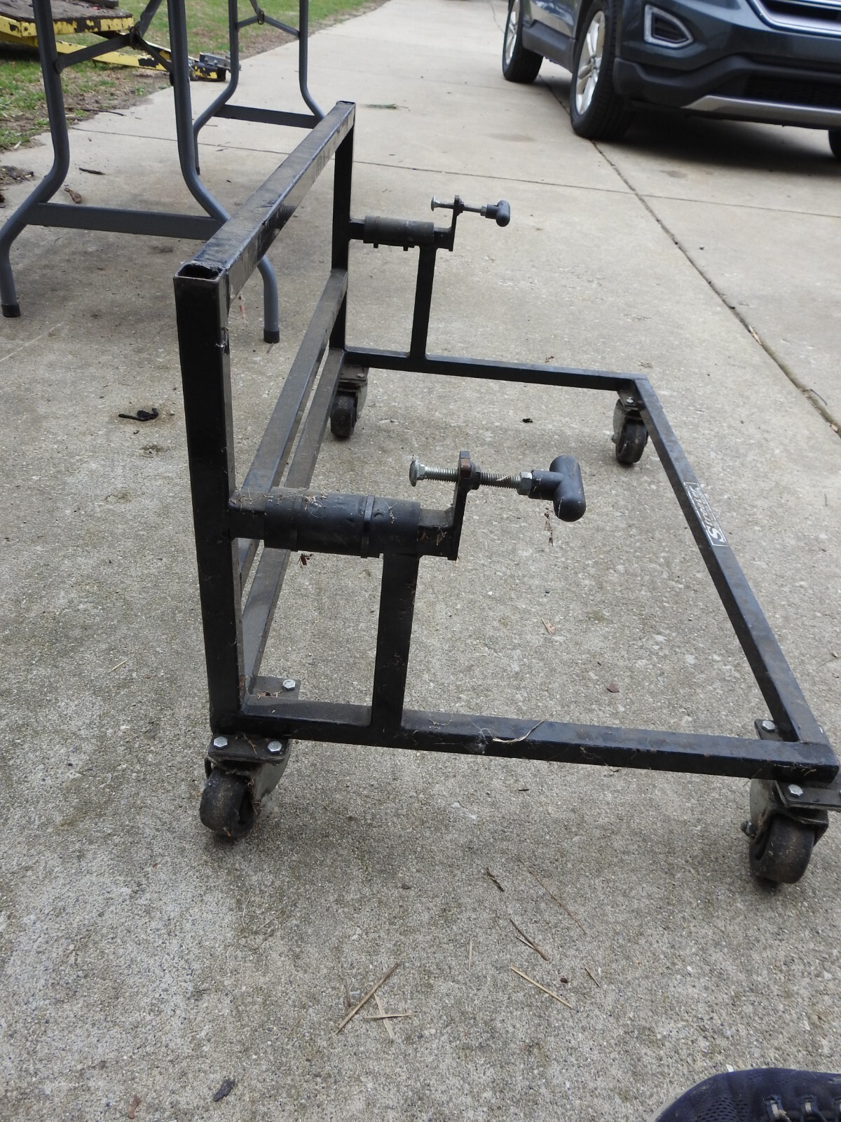 Streeter upright rolling kart stand for contained storage of go kart ...