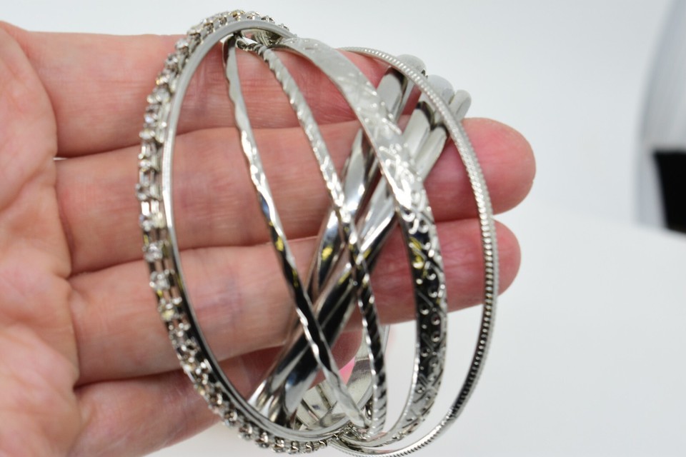 Bangle Bracelets Silver Tone Stack of 8 Connected Nice Bangle Bracelets ...