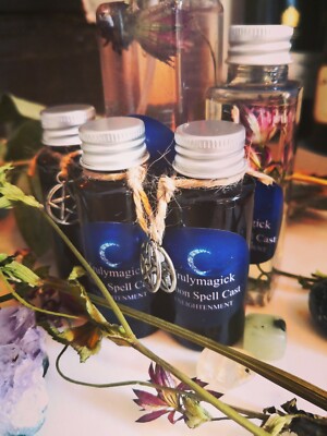 DEMON REMOVAL BODY & ANOINTING OIL . Pagan WITCHCRAFT OIL holding ...