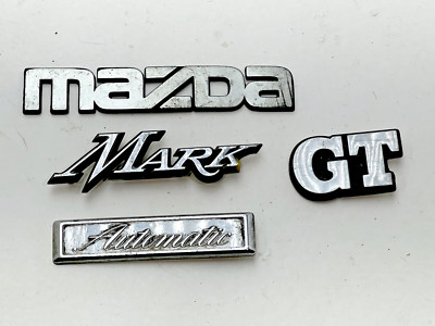 Lot of Japanese Plastic Emblems Mazda Mark GT Automatic Fender Ornament ...