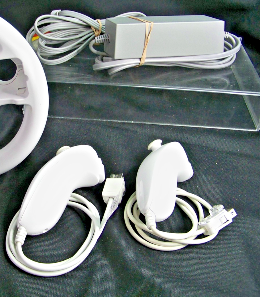 Pre Owned Wii Bundle With Wii Fit Bourdy / 4 Wii Motes / 2 Nun Chucks ...