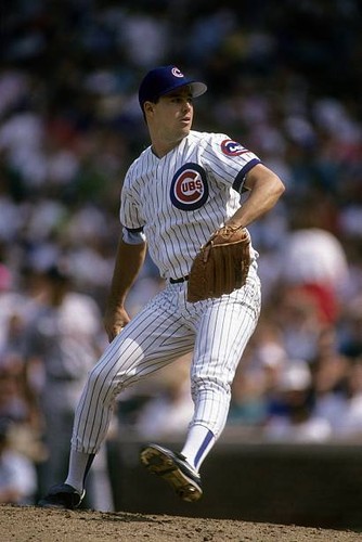 Pitcher Greg Maddux Chicago Cubs pitches in circa 1980's - Baseball ...