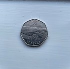2011 Olympic Aquatics 50p - a tale of two strikings