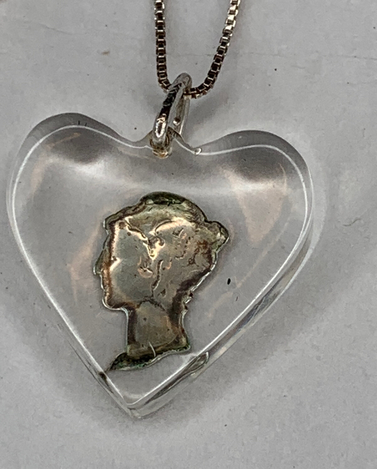 1940s sterling silver floating mercury dime head luci… - Gem