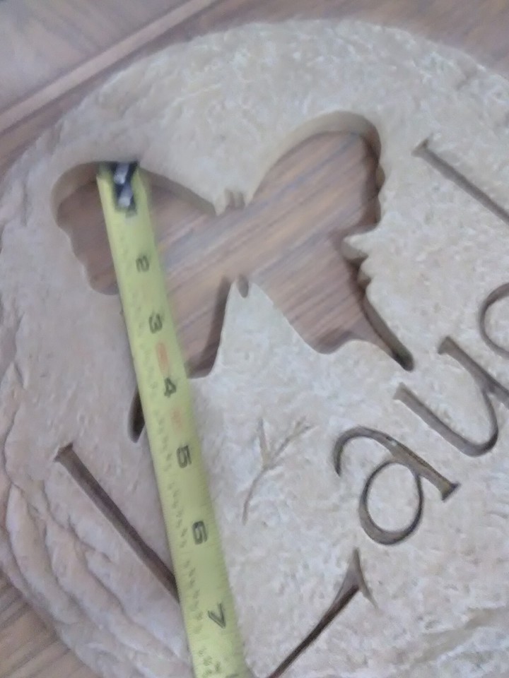 11" round rock slab design with butterfly cut-out and imprinted word ...