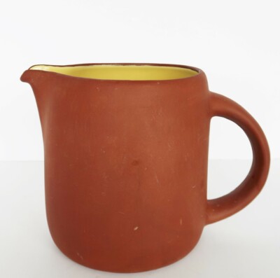 Vintage Wellfleet Pottery pitcher brown with yellow interior glaze | eBay