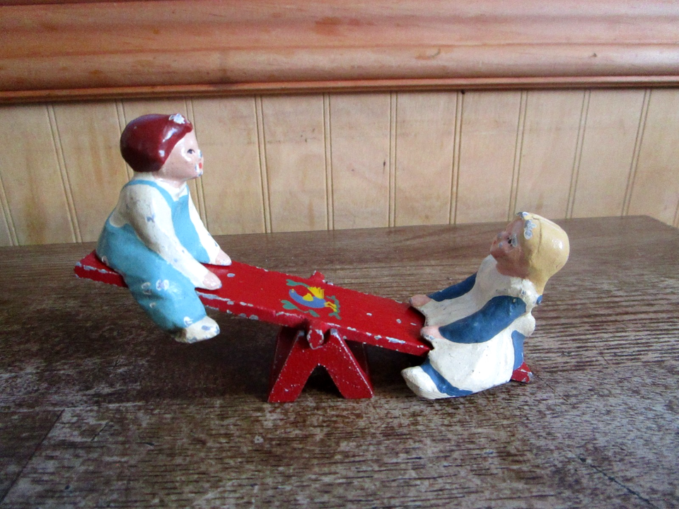 Vintage Cast Iron Girl & Boy on See-Saw Toy | eBay