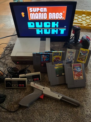 Nintendo NES console bundle with controllers, zapper, joysticks and ...