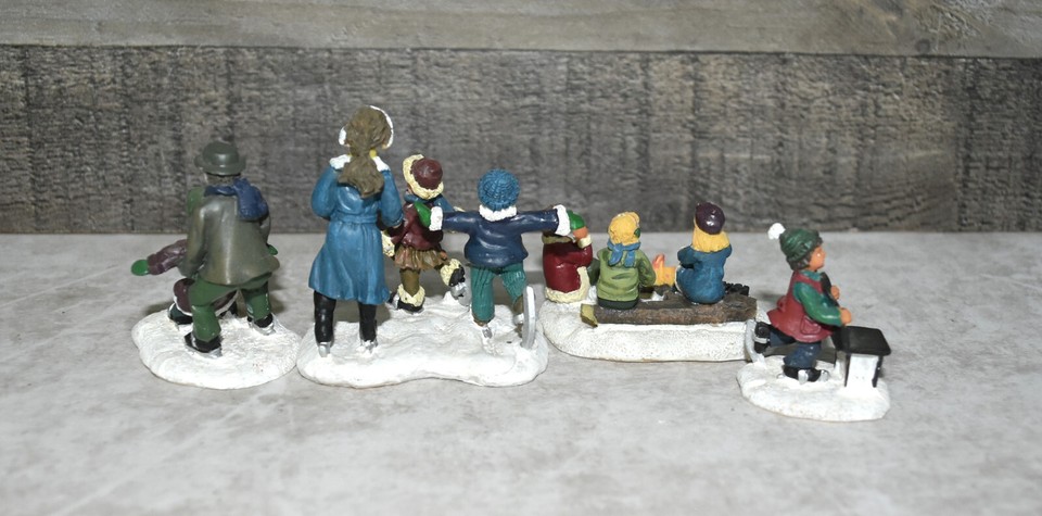 4 pc St Nicholas Square Kids Skating Christmas Village People Figures ...