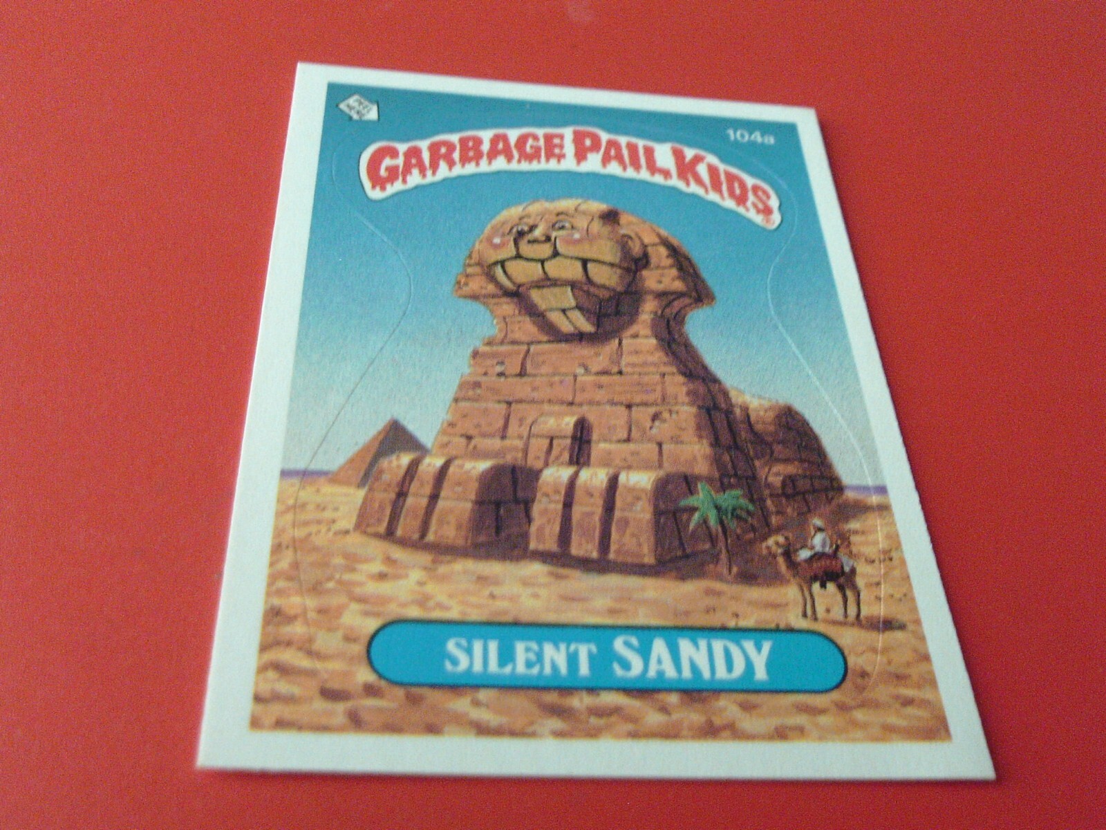 VINTAGE 1986 TOPPS SILENT SANDY GARBAGE PAIL KIDS#104a STICKER SERIE 3 ...