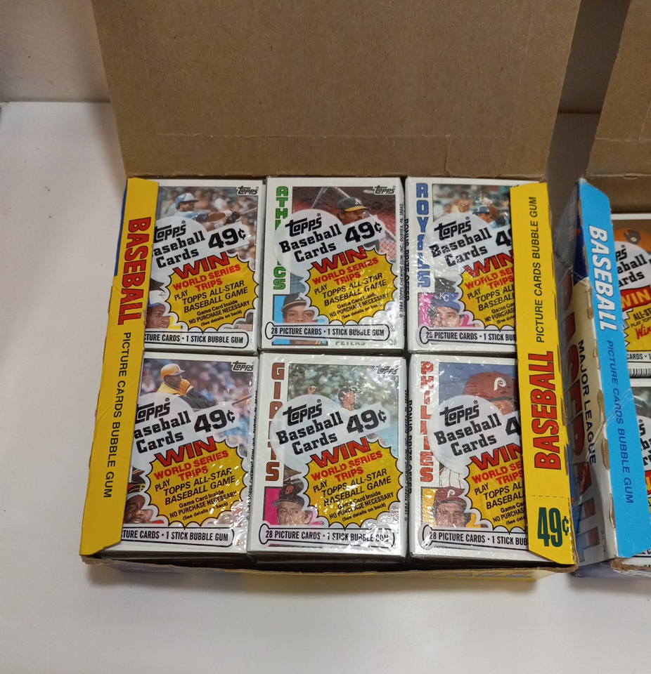 1984 and 1985 Topps Cello Boxes. 1984 is complete. 1985 has 9 cello ...