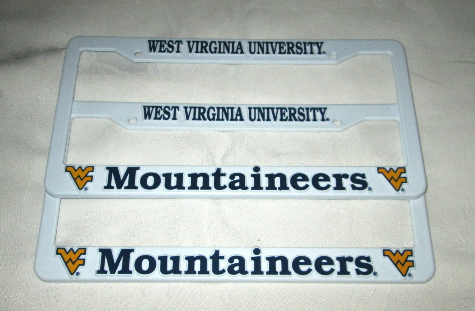 TWO (2) WEST VIRGINIA MOUNTAINEERS EMBOSSED LICENSE PLATE FRAMES #1 ...