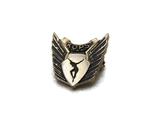 KOPS Lettered Pin Wings & Person Graphic Gold Tone | eBay