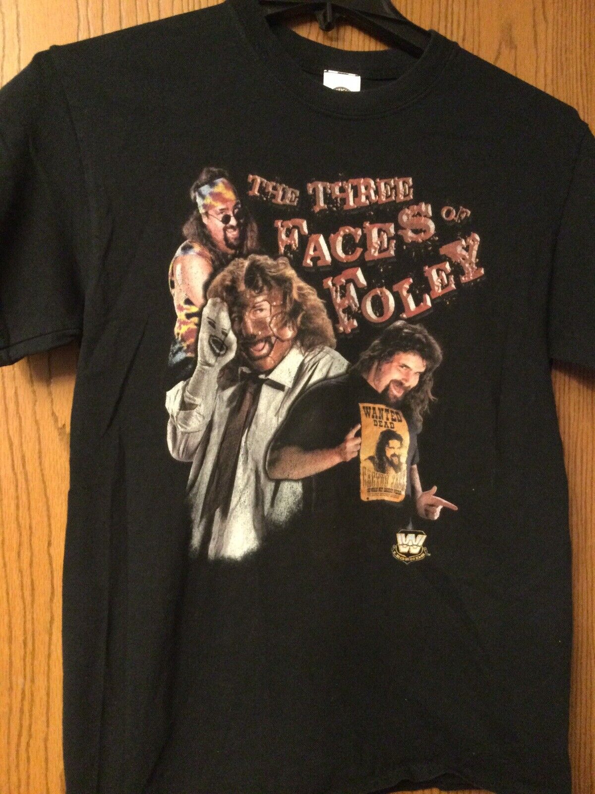 Foley - “The Three Faces Of Foley”. Black Shirt. M. - Gem