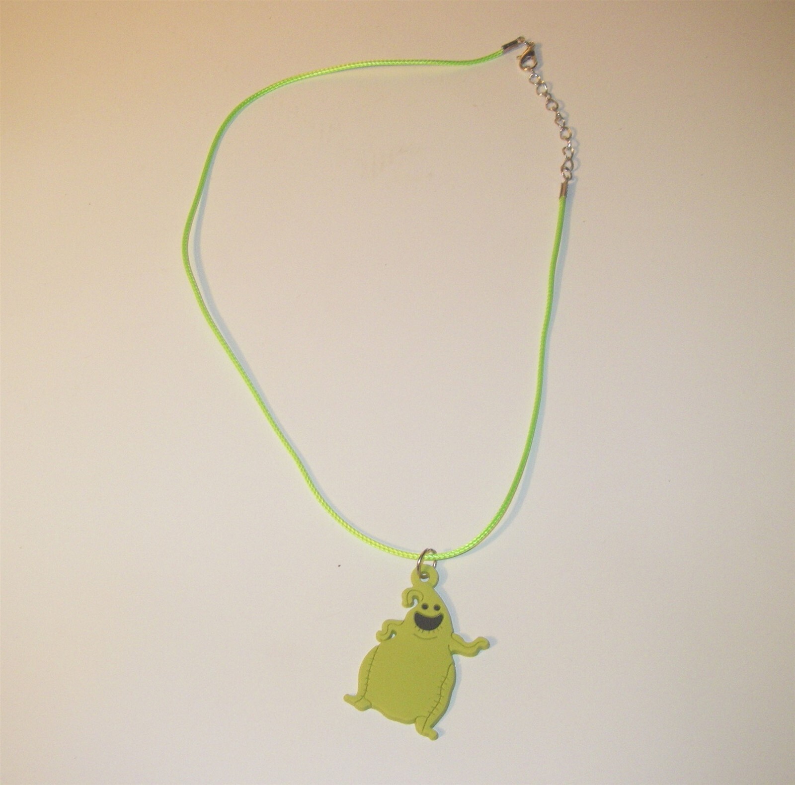THE NIGHTMARE BEFORE CHRISTMAS OOGIE BOOGIE UNBRANDED RUBBER NECKLACE ...