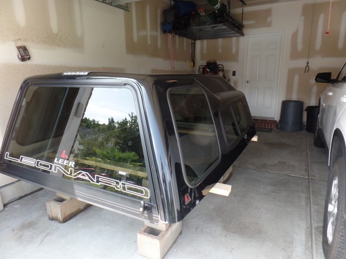 Leer 122 truck cap/camper. Black, fits Chevrolet Silverado 2007 through ...