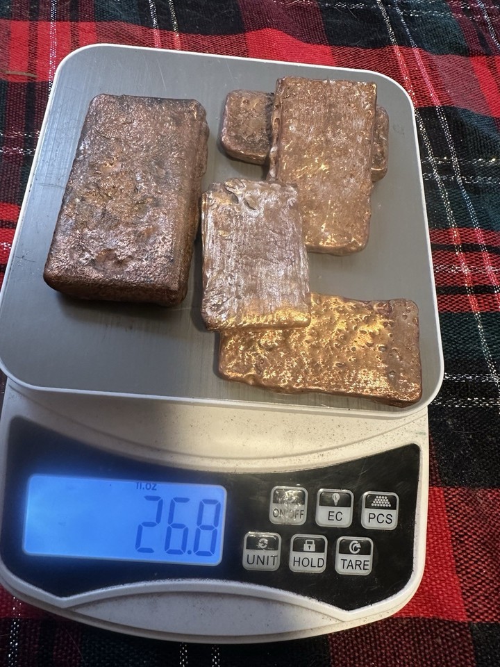 153 oz. of Pure copper and 14oz of Nordic Gold! All hand poured bars ...