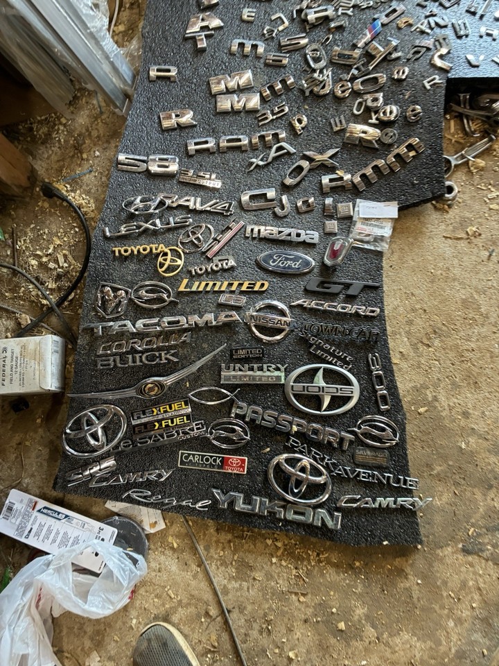EMBLEMS BADGES LETTERS ASSORTMENT OF OEM EMBLEMS LOT Dodge Ford Toyota ...