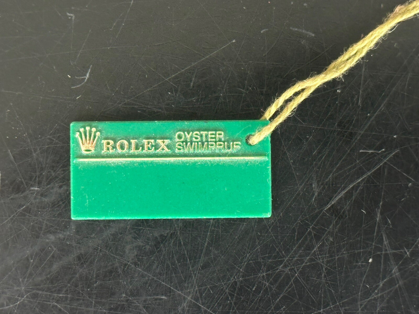 Genuine Rolex 14060 Submariner Green Swing Tag - Gem