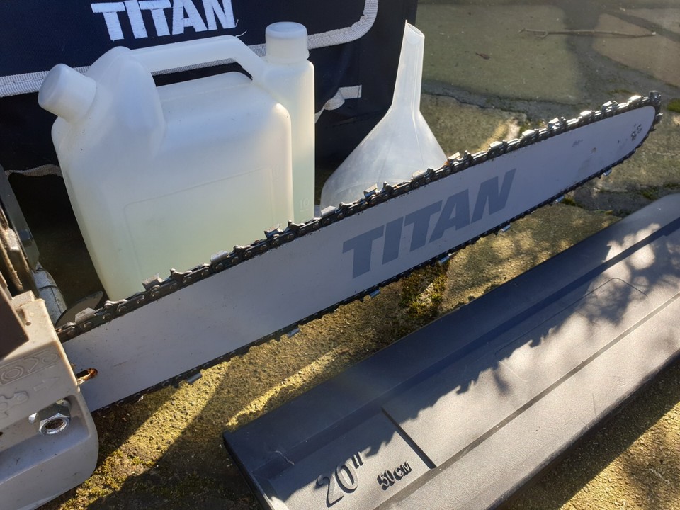 Titan Petrol Chainsaw TTCSP49 49.3CC Powerful Easy Start 2 Stroke Wood ...