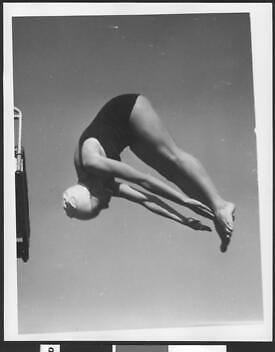 Female diver reaching for her toes as she dives 1930 California Old ...
