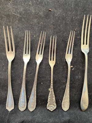 6 STRAWBERRY FORKS STERLING IN DIFFERENT PATTERNS PART OF A LARGE ...