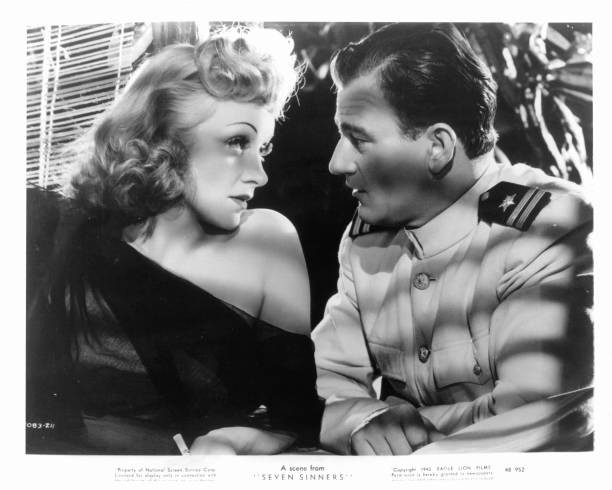 Marlene Dietrich John Wayne gaze into each others eyes a scene fil- Old ...