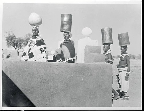 People Carrying Water Containers 1955 Photo - Native water carriers ...
