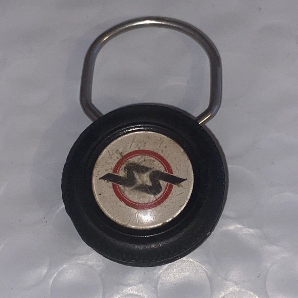 Vintage Co-op Tires SS Key Ring With Red Label In Tire And SS logo On ...