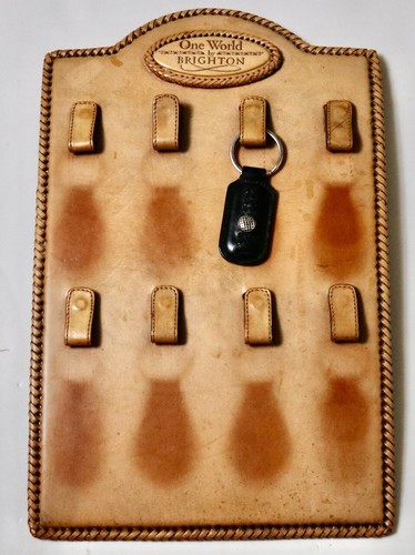 BRIGHTON One World vintage leather counter display with keychain | eBay