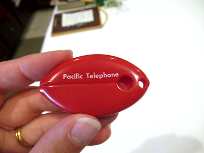 Pacific Telephone keychain and coin holder, red vinyl | eBay