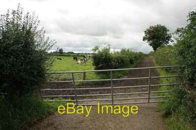 Photo 6x4 Muddy Laneway Wallslough Farm gate and laneway near the R700 ...