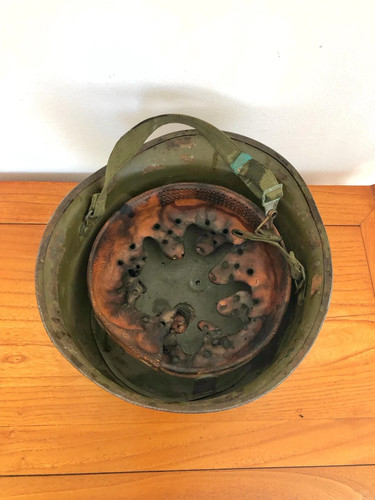 World War II US helmet (101st airborne, 506 regiment) with spade ...