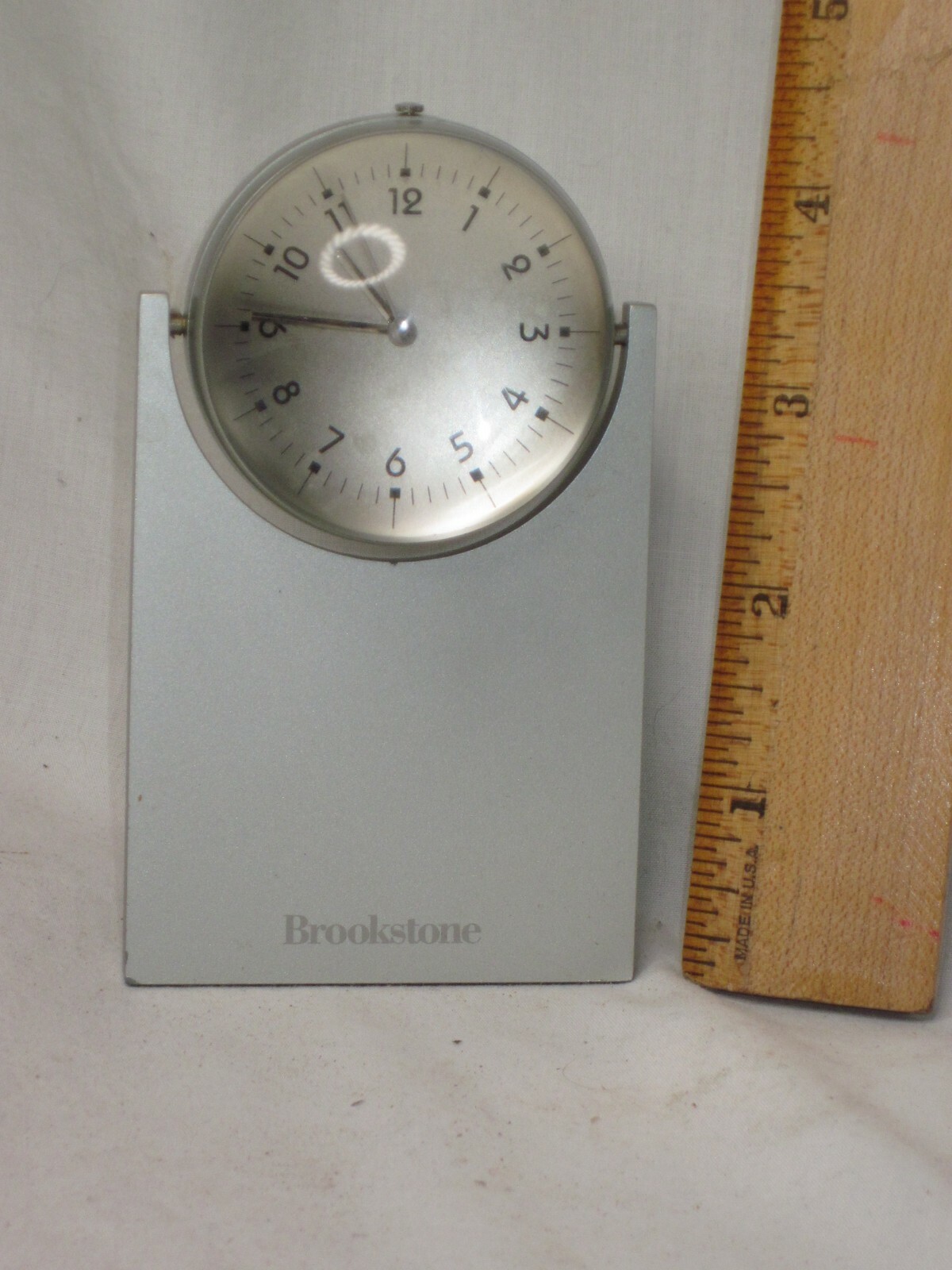 unique Brookstone rotating quartz clock orb ball sphere photo holder ...